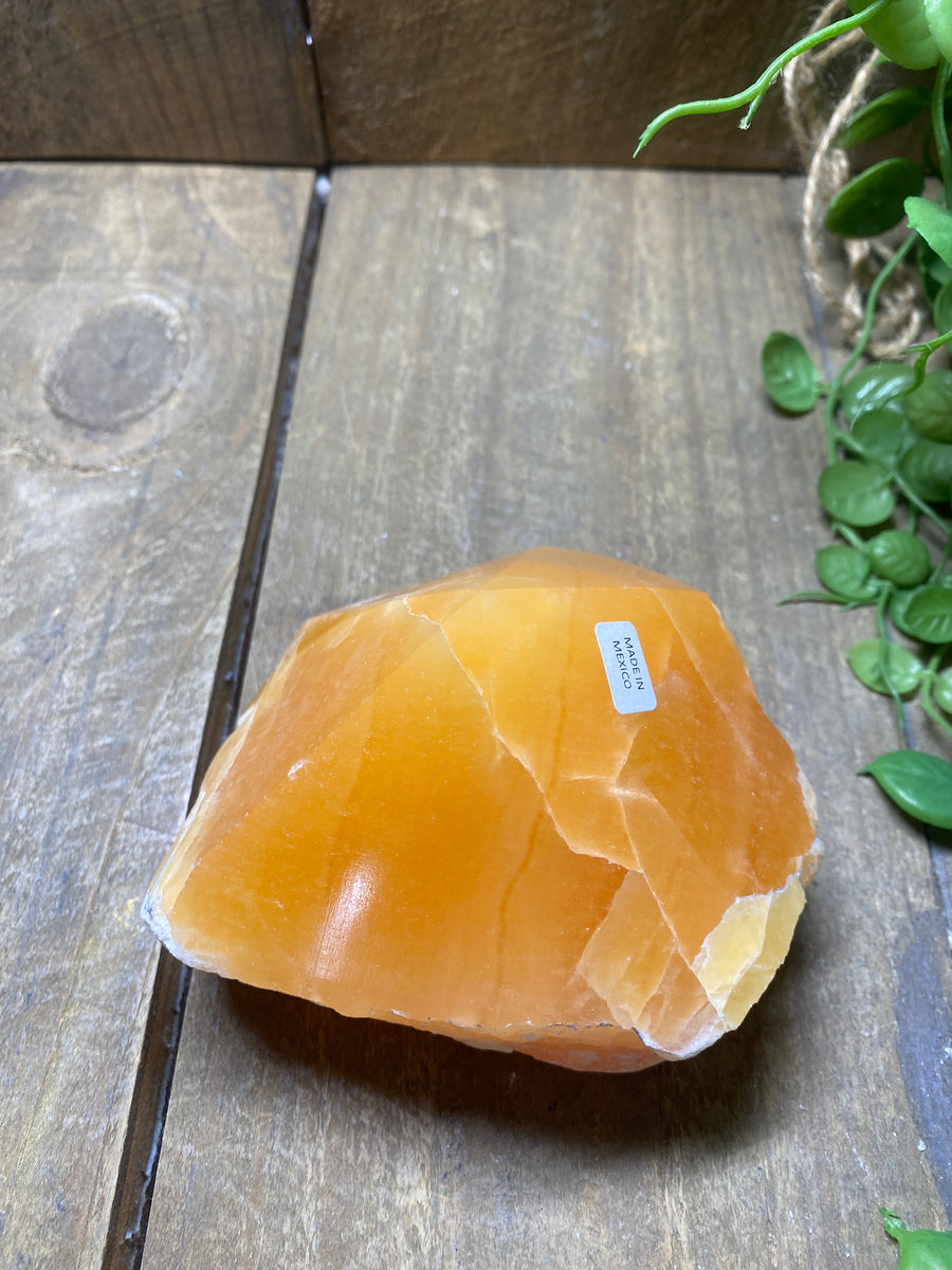 Orange Calcite semi polished points – Evolving Earth Designs
