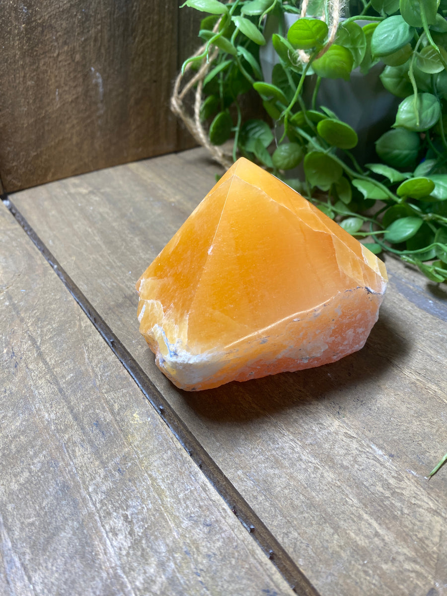 Orange Calcite semi polished points – Evolving Earth Designs